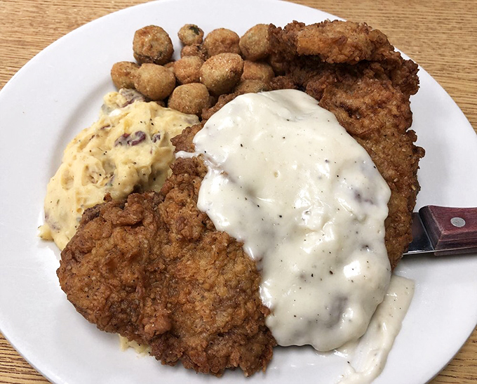 Country fried steak smothered in creamy gravy isn't diet food&mdash;it's therapy on a plate, with crispy edges that crunch like autumn leaves.