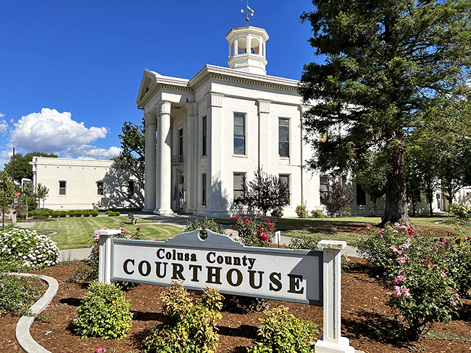 The majestic Colusa County Courthouse has witnessed generations of local history since 1861. Its neoclassical columns stand proud against California's blue skies.