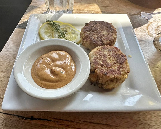 These golden crab cakes are what seafood dreams are made of – minimal filler, maximum flavor.