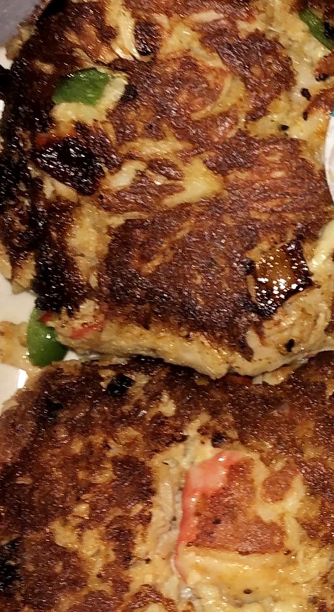 Golden-brown crab cakes that look like they were made by someone who actually respects the crab inside them.