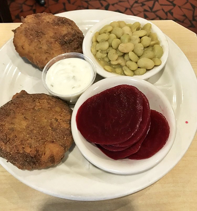 Crab cakes flanked by lima beans and beets &ndash; comfort food that actually comforts.