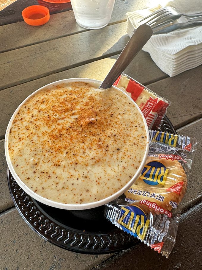 That cream of crab soup looks thick enough to stand a spoon in, rich enough to retire on.