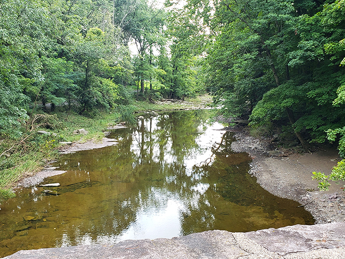 A peaceful moment by Wickecheoke Creek, where the water has flowed beneath travelers for over two centuries.