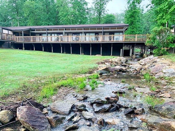 Where tranquility meets architecture—this creekside lodge offers front-row seats to nature's babbling brook concert, no tickets required.