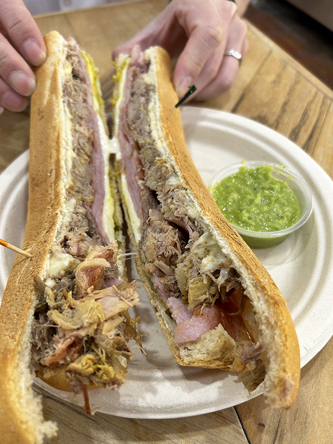 This Cuban sandwich isn't just lunch – it's an engineering masterpiece of perfectly pressed bread, melted cheese, and succulent meats.