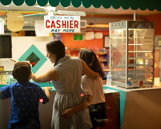Family movie night takes on new meaning at the concession stand, where memories are made one popcorn kernel at a time.