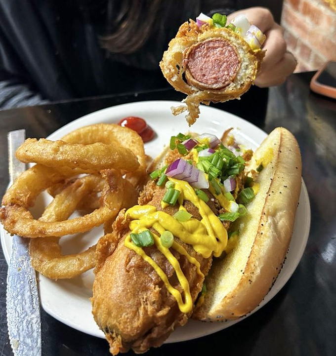 Behold the deep-fried hot dog—a beautiful monument to the idea that anything worth eating is worth eating with extra crunch.