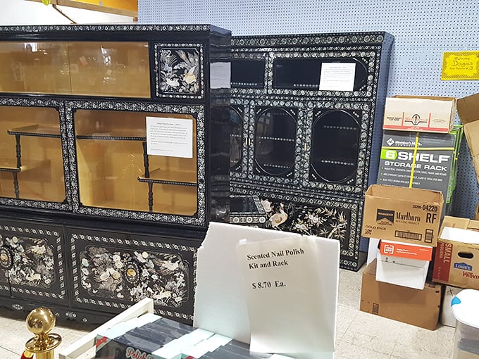 Ornate display cabinets that would make Downton Abbey's butler raise an approving eyebrow. Functional art waiting for its second act in someone's home.