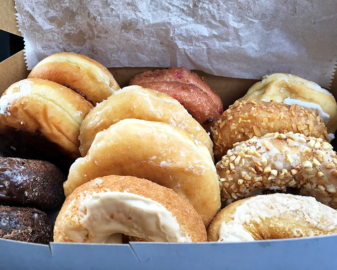 A box of joy containing more happiness than most people experience in a week&mdash;from cinnamon-dusted to chocolate-dipped, each donut promises a moment of bliss.