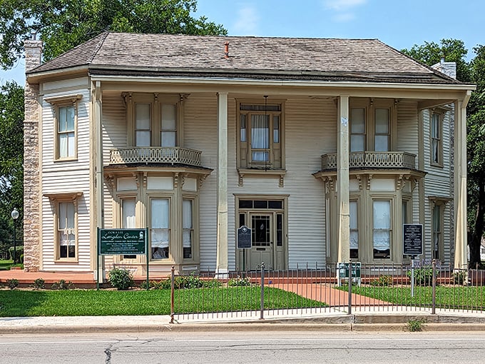 The Dora Lee Langdon Center's stately white columns and wraparound porch practically whisper, "Come sit a spell." Southern hospitality in architectural form.