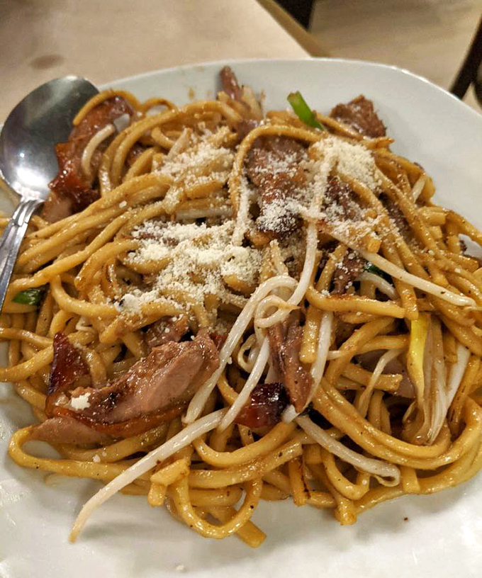 These duck garlic noodles don't just satisfy hunger&mdash;they solve problems. Bad day at work? Relationship troubles? One twirl of this fork and suddenly life seems manageable again.