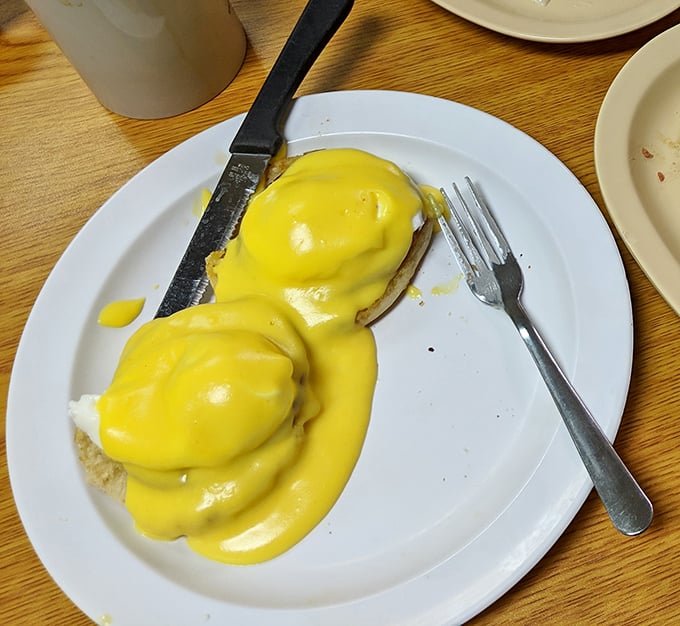 Eggs Benedict done right&mdash;English muffins supporting poached eggs beneath a sunshine-yellow hollandaise that practically glows with buttery promise.