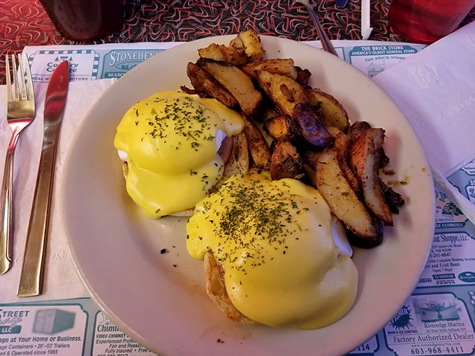 Eggs Benedict: the aristocrat of breakfast that somehow feels right at home in a diner. That hollandaise sauce practically glows with buttery promise.