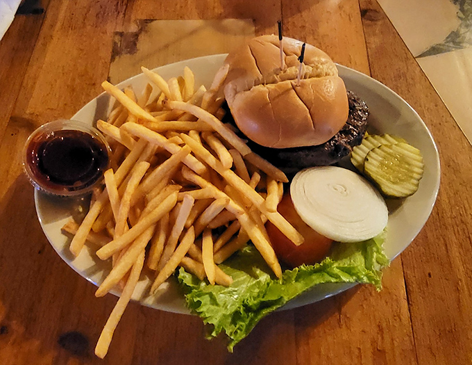 This burger doesn't just come with fries&mdash;it comes with a story. Crisp lettuce, juicy tomato, and a patty that makes fast food chains weep with inadequacy.