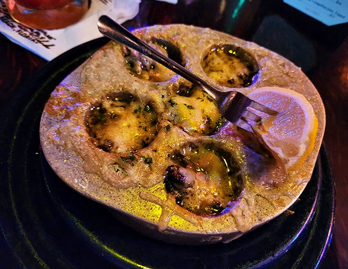 Escargot swimming in buttery, garlicky goodness. Proof that sometimes the most intimidating-sounding dishes deliver the most comforting flavors.