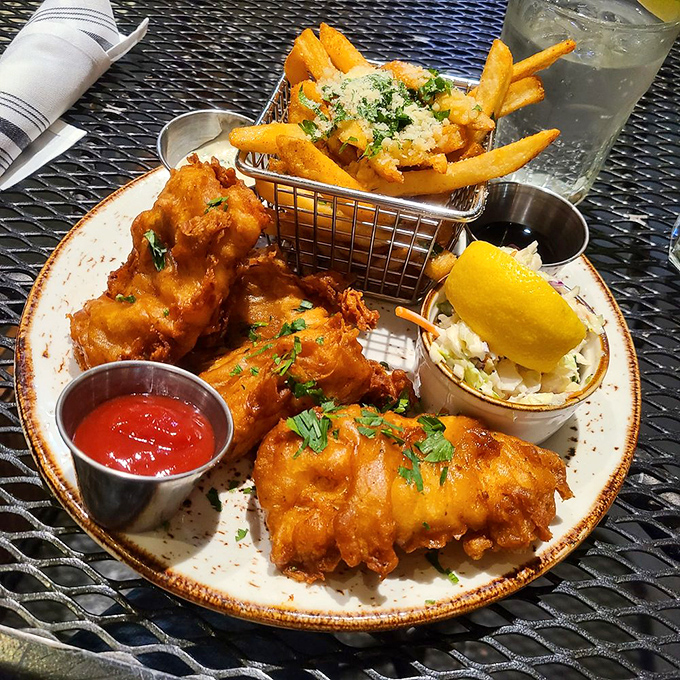 The holy grail of fish and chips &ndash; golden, crispy batter protecting flaky white fish that practically begs for a squeeze of lemon and a cold beer companion.