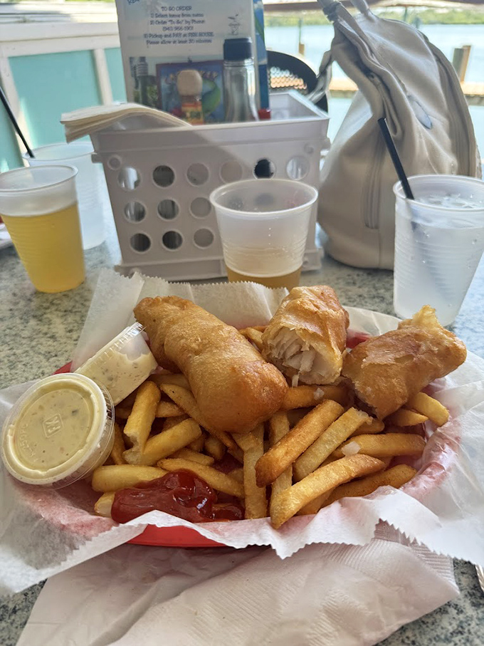 Fish and chips that would make a British pub jealous. That golden batter is performing the culinary equivalent of a standing ovation.
