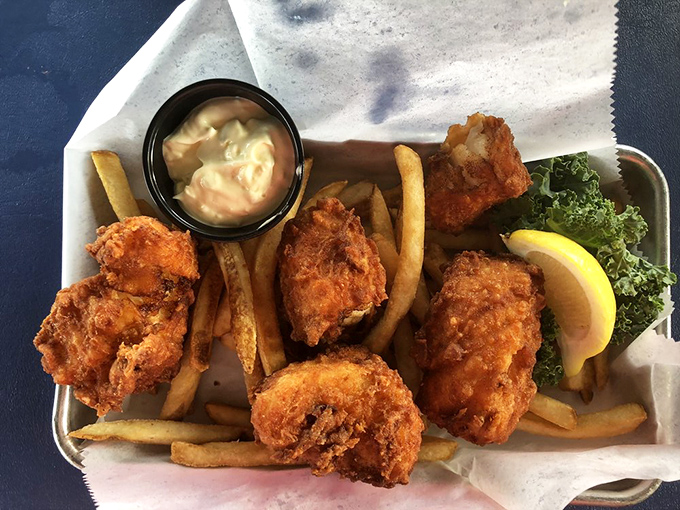 Golden, crispy fish and chips that would make a British pub jealous, served with a tartar sauce worth bottling and taking home.