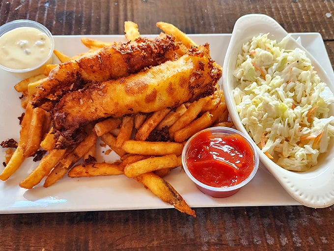 Fish so perfectly battered it makes you wonder if Neptune himself is back there with a fryer and a dream.