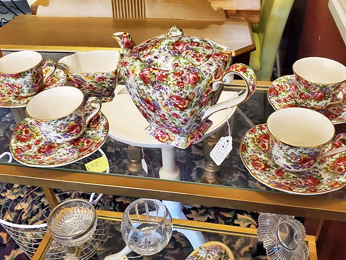 A floral tea set awaiting its next garden party. Just imagine the gossip these cups could spill if they could talk about their previous owners.