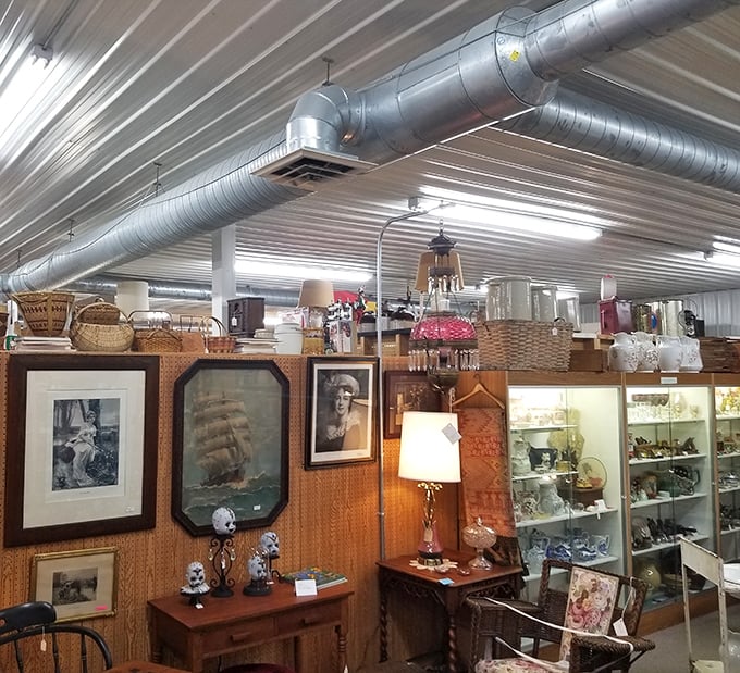 A gallery wall that tells America's story through deer portraits, vintage landscapes, and that lamp your spouse will pretend to hate.