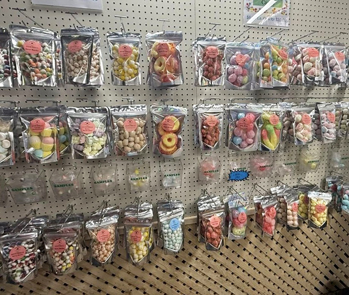 Sweet temptations hang in neat rows, like a science experiment gone deliciously right. Nostalgia in resealable bags.
