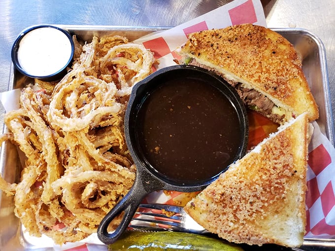 A French dip that would make Paris jealous, paired with onion rings that could double as delicious golden halos. Dipping required, sharing optional.