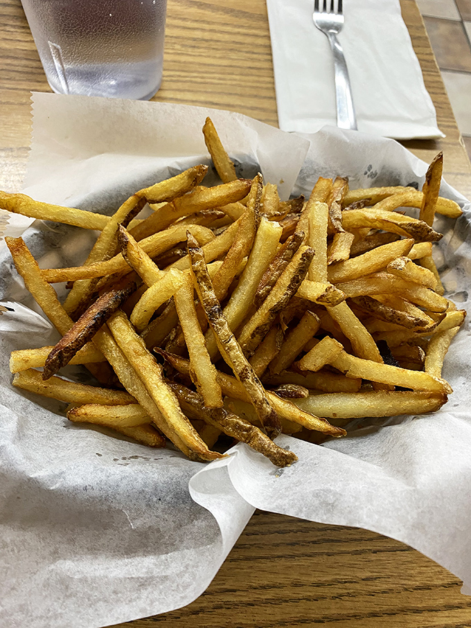 Golden, crispy, hand-cut fries that somehow manage to hold their own against the smokehouse stars. No afterthought here.