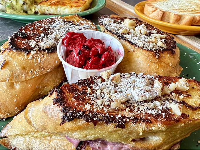 French toast that's clearly been to finishing school. That berry compote is the ruby necklace this golden-brown beauty deserves to wear.