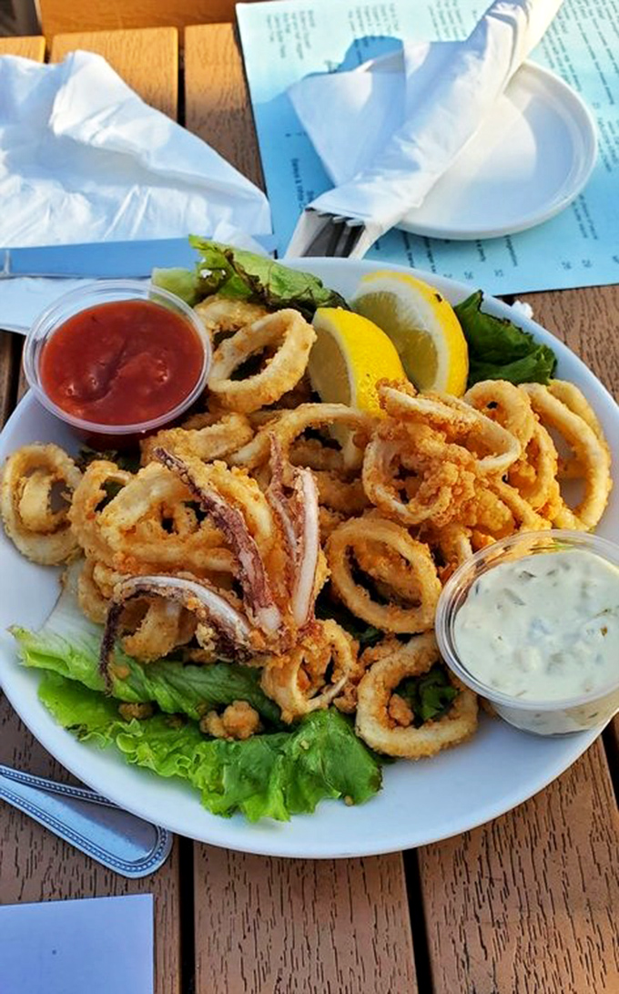 Golden-fried calamari that crunches just right before yielding to tender perfection. The dipping sauces are merely supporting actors in this seafood blockbuster.