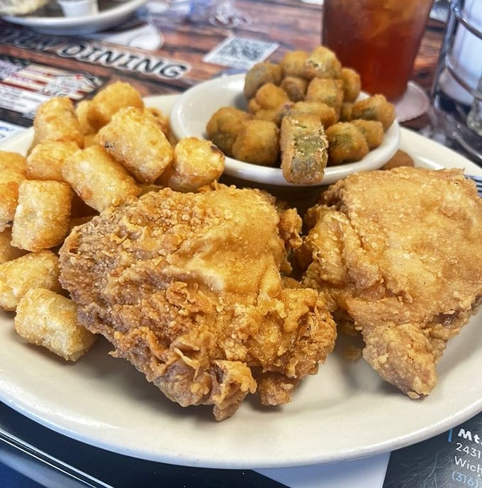 Golden-brown fried chicken that makes you understand why people cross roads. Those crispy edges are worth every calorie.