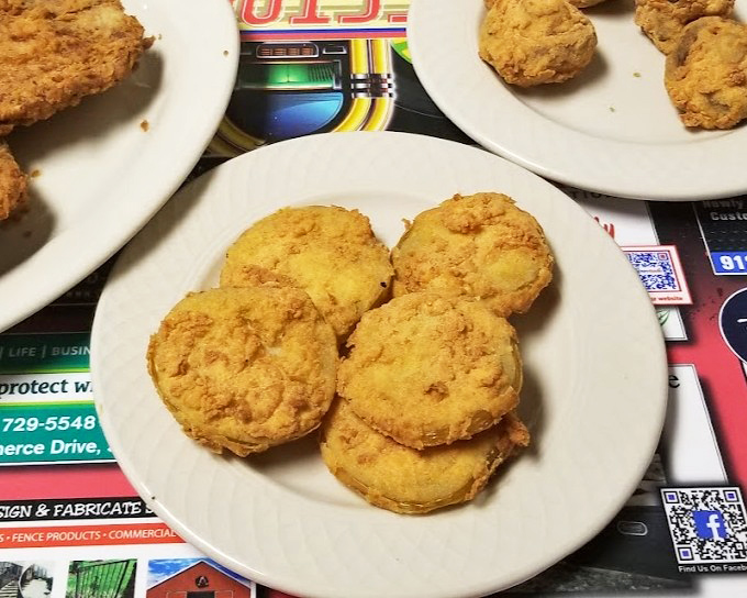 Golden-fried biscuits that look like they could solve most of life's problems. Comfort food that requires no translation in any language.