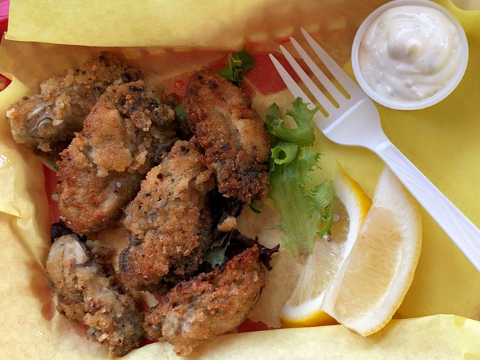 Golden fried oysters arrive crispy and perfect, like edible treasures from Neptune's personal jewelry box.