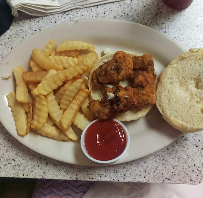 Fried oysters that achieve the impossible—crispy exterior giving way to that briny, oceanic treasure inside. The Chesapeake Bay on a plate.