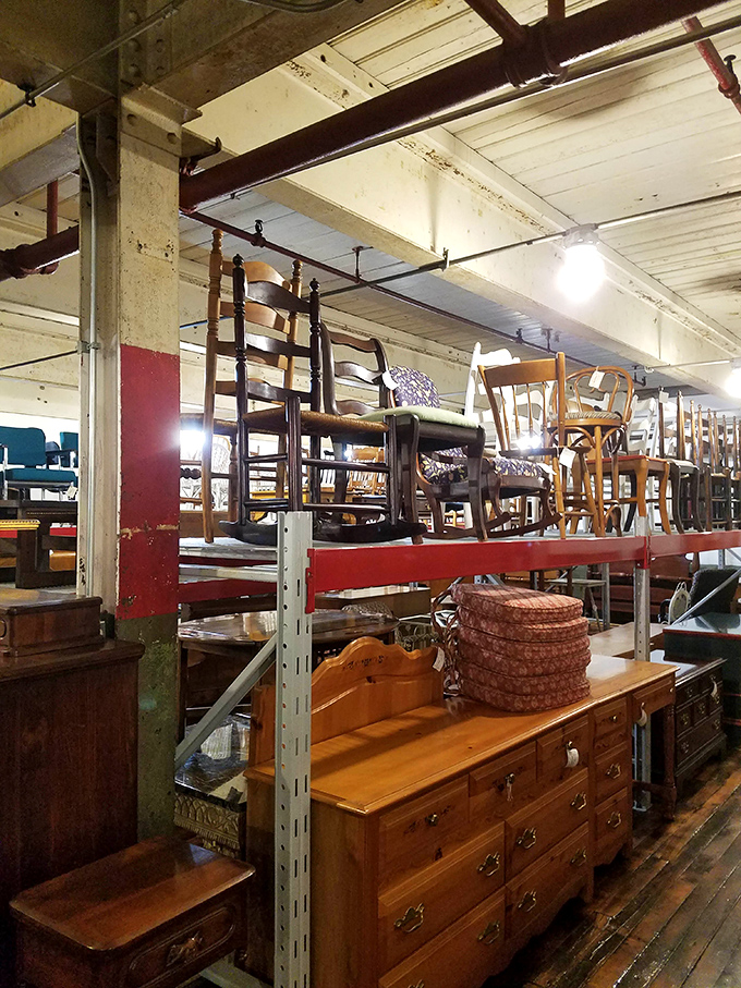 Chair heaven exists, and it's on this industrial shelf. Each one has survived decades of family dinners and holiday gatherings to tell its tale.