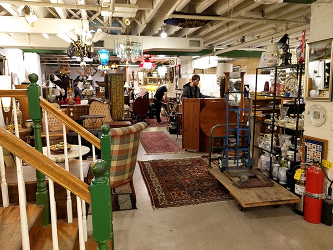 Oriental rugs anchor elegant furniture groupings like islands of history. That leather club chair has definitely heard some stories worth telling.