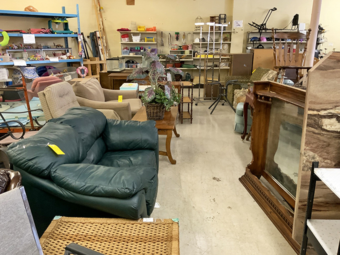 The furniture section: where leather recliners meet antique side tables in a beautiful democracy of comfort. That fireplace mantel has stories to tell!