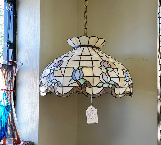 Not just a lamp, but a stained-glass symphony hanging from the ceiling. Your grandmother would approve; your electric bill might not.
