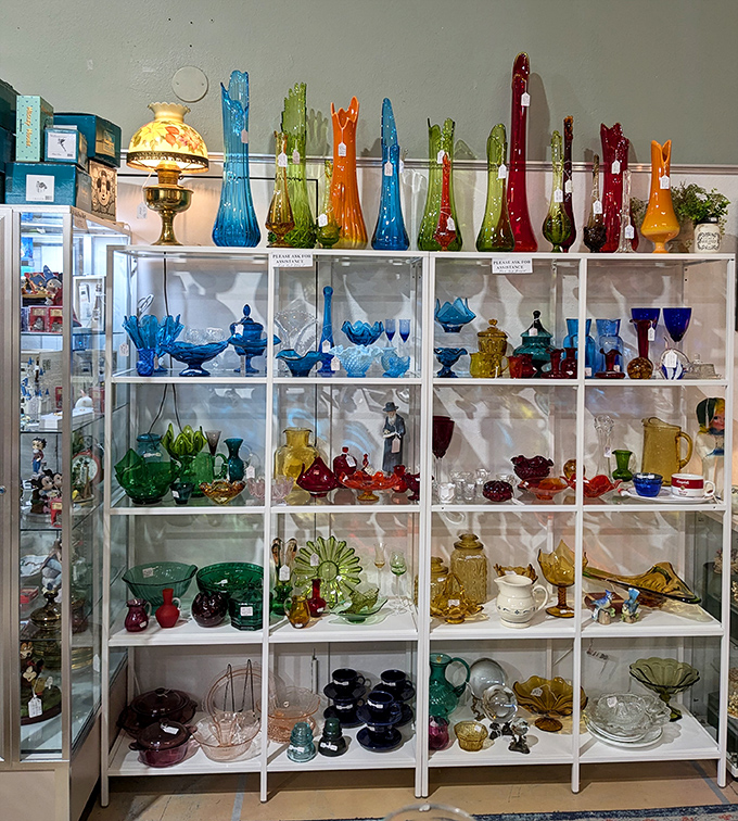 Whimsical birdhouses fashioned from vintage teapots prove that one generation's kitchenware becomes another's garden charm. Creativity perched on pegboard.