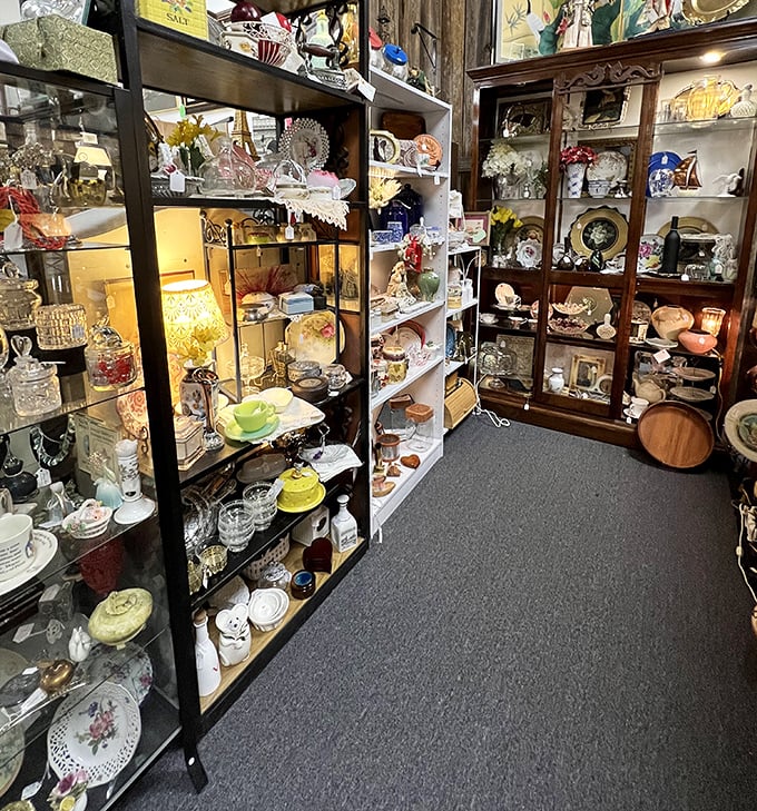 Crystal, china, and glassware that survived decades of dinner parties now wait for new homes. These shelves hold more stories than a library.