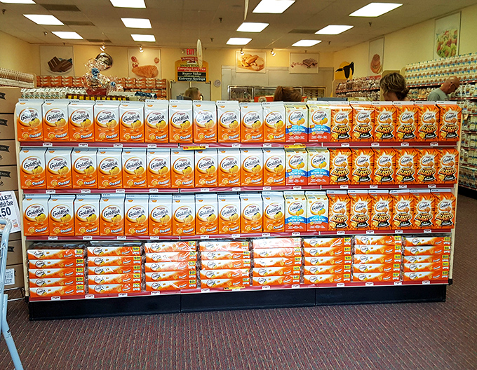 The Goldfish display: where snack decisions become existential crises and parents negotiate with toddlers like international diplomats.