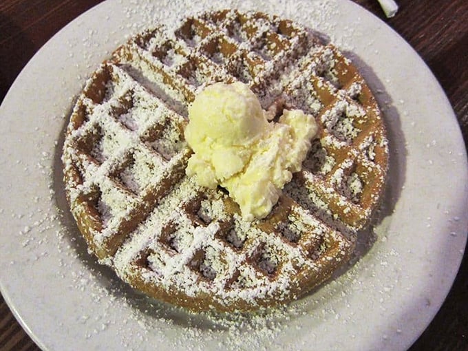 The waffle grid pattern: nature's perfect design for holding pools of melting butter and maple syrup. A simple masterpiece crowned with powdered sugar.