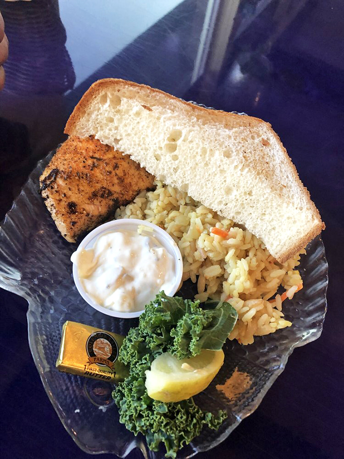 This sandwich isn't just lunch, it's a perfectly engineered seafood delivery system with just the right supporting cast.