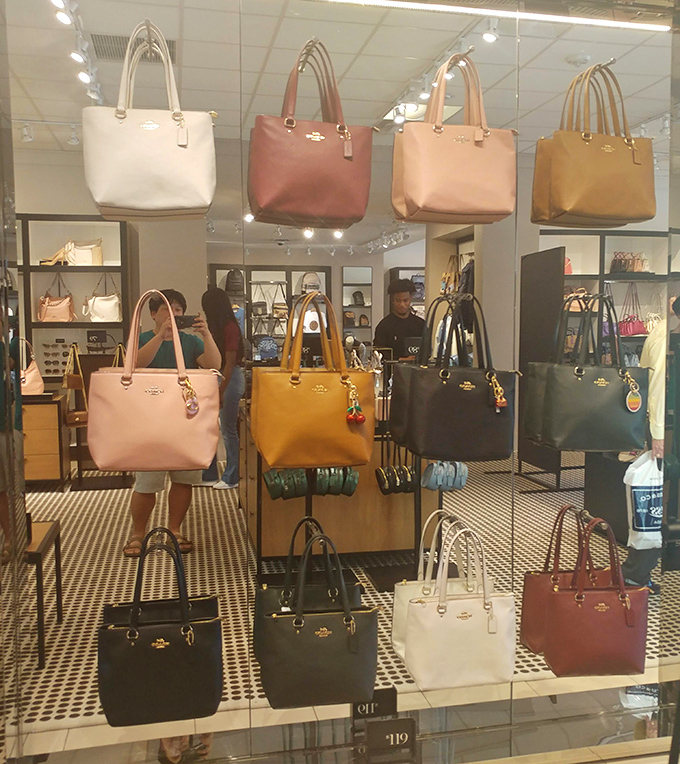 Coach handbags displayed like fine art in a museum where you're actually encouraged to touch the exhibits &ndash; and take them home.