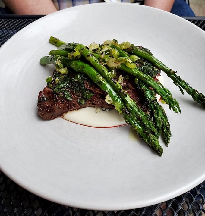 Simple yet spectacular: perfectly seared hanger steak topped with bright asparagus spears and a drizzle of reduction that means business.