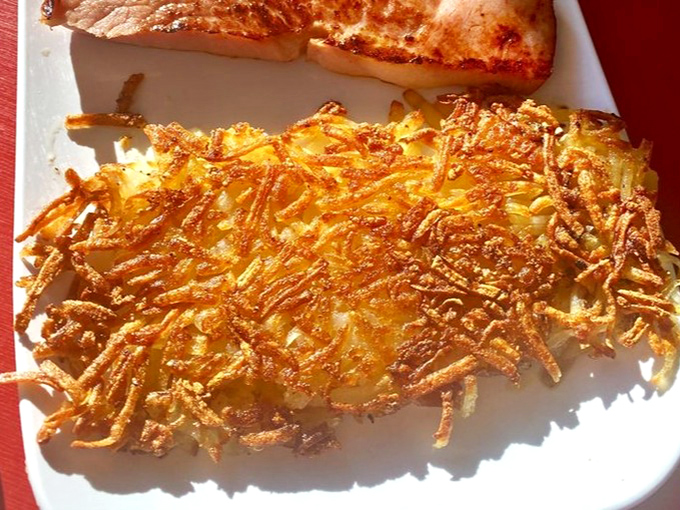 Hash browns that have achieved the golden-brown perfection most home cooks dream about. Crispy, lacy edges that make you want to frame them.