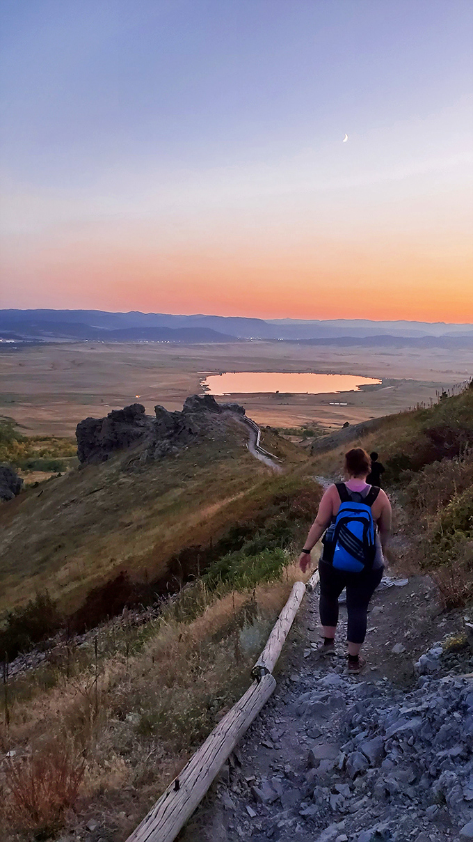 Sunset hikers know the secret: twilight transforms Bear Butte's trails into a magical journey where every step feels like walking through a painting.