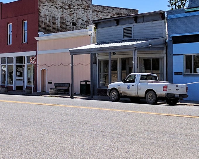 Main Street's pickup trucks and pastel buildings create that rare authentic small-town vibe that Hollywood keeps trying (and failing) to replicate.