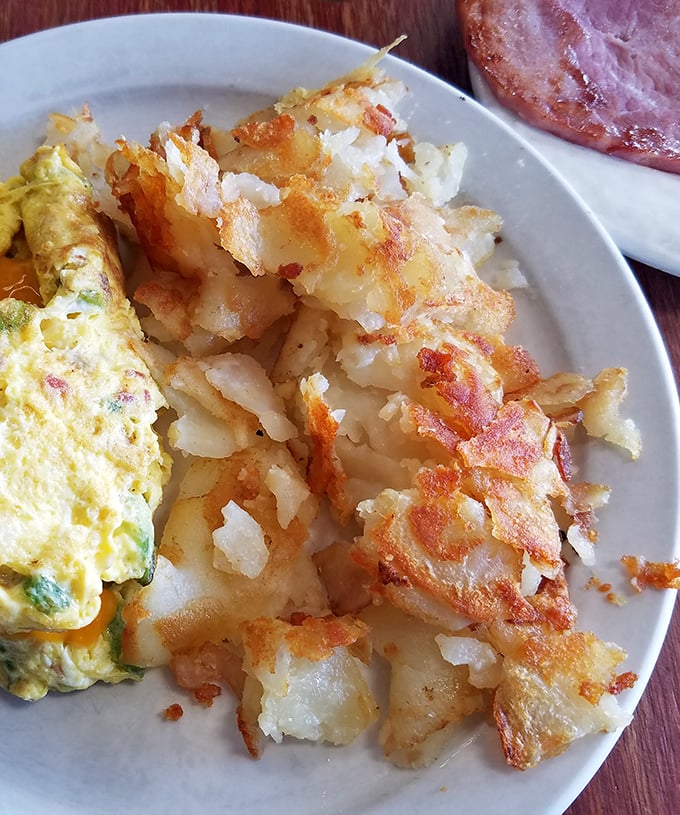 These aren't just home fries; they're potato perfection&mdash;crispy edges giving way to fluffy interiors. The kind worth fighting your tablemates for.
