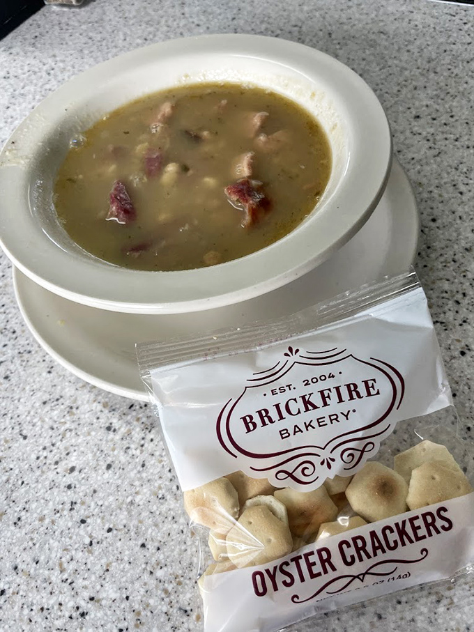 Bean soup that looks like it could sustain a Wyoming rancher through winter, served with crackers from the local Brickfire Bakery.